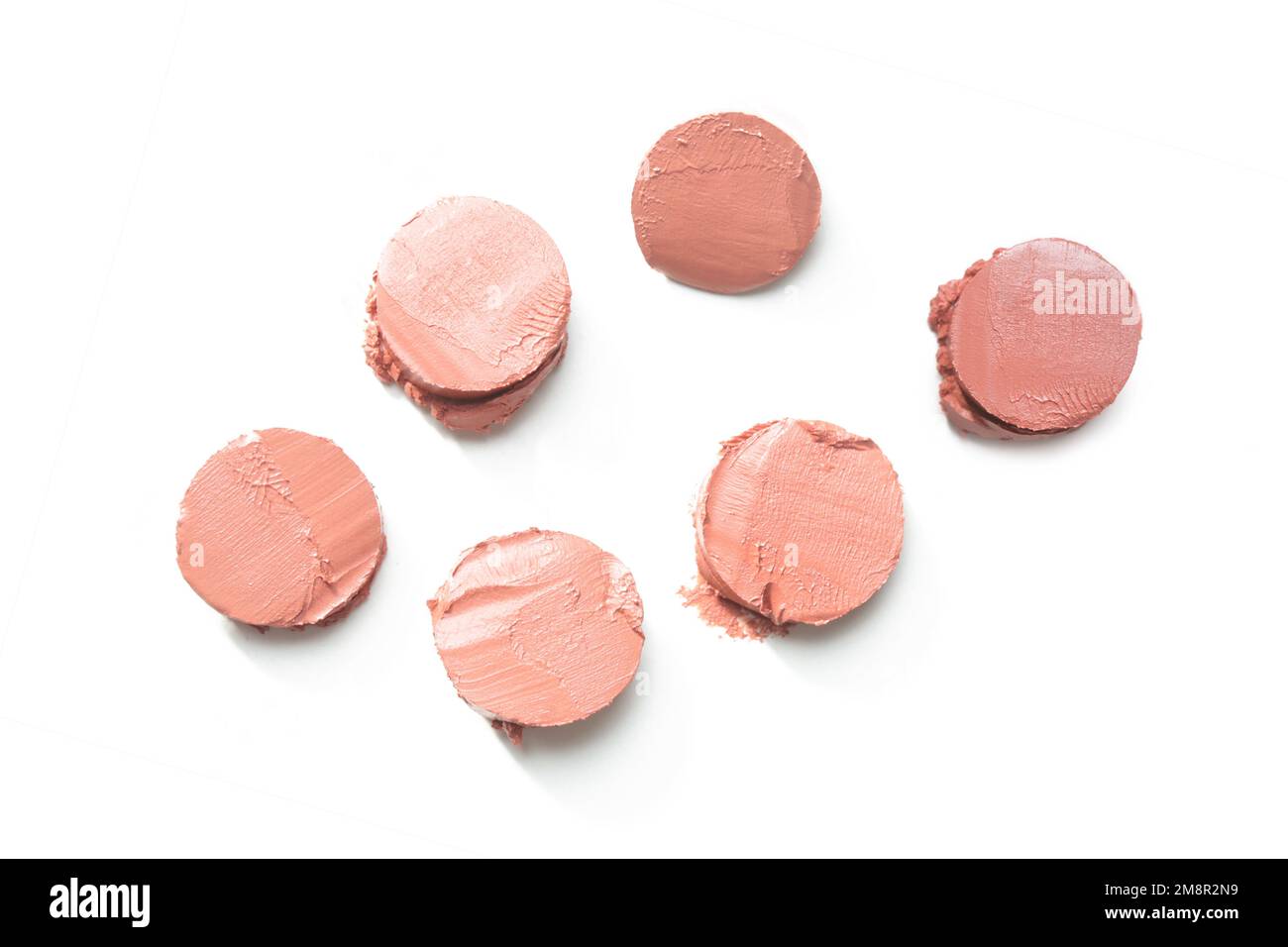 Brown creamy make up cuts isolated on white background Stock Photo - Alamy