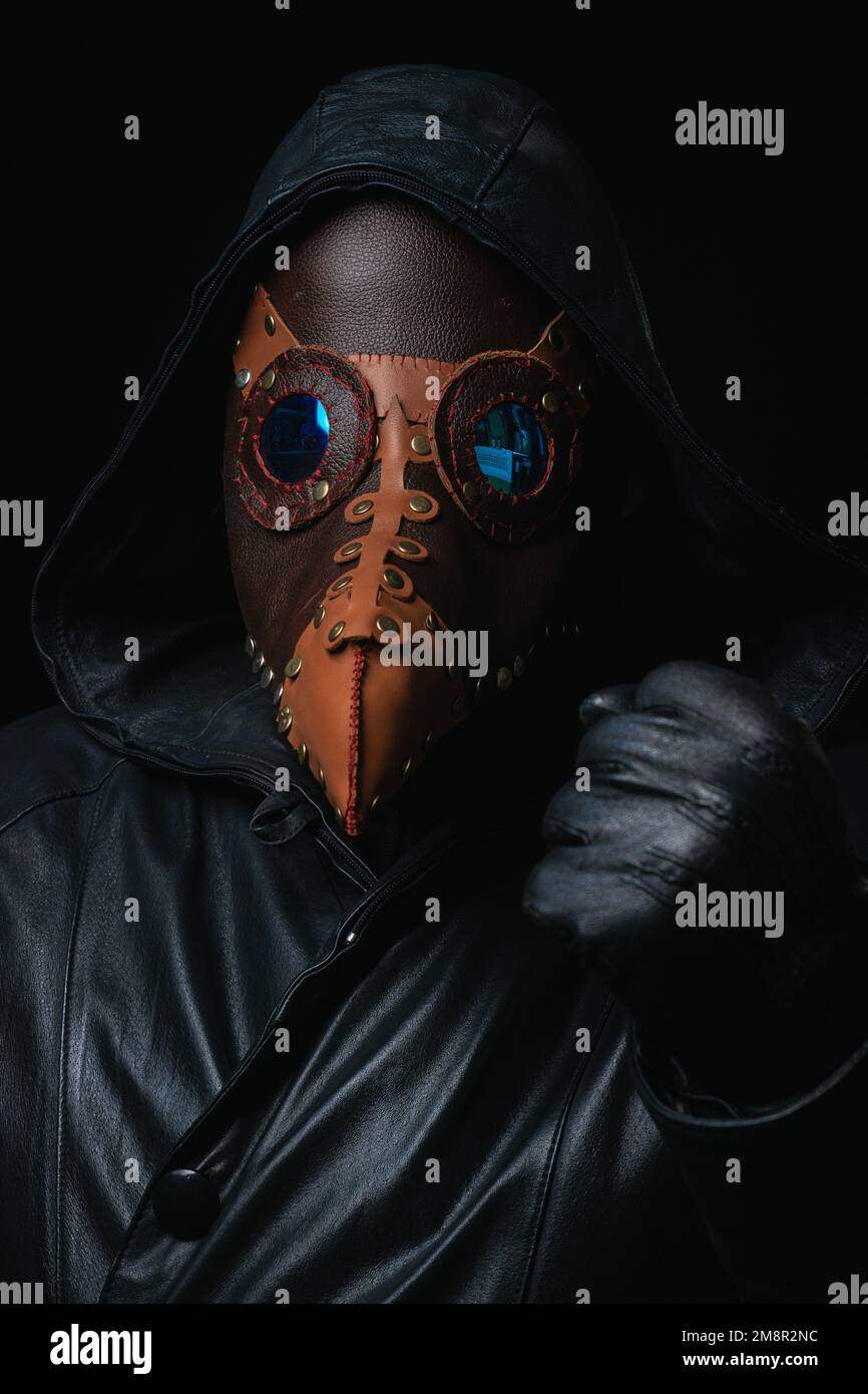 Plague doctor with crow-like mask isolated on black background Creepy ...