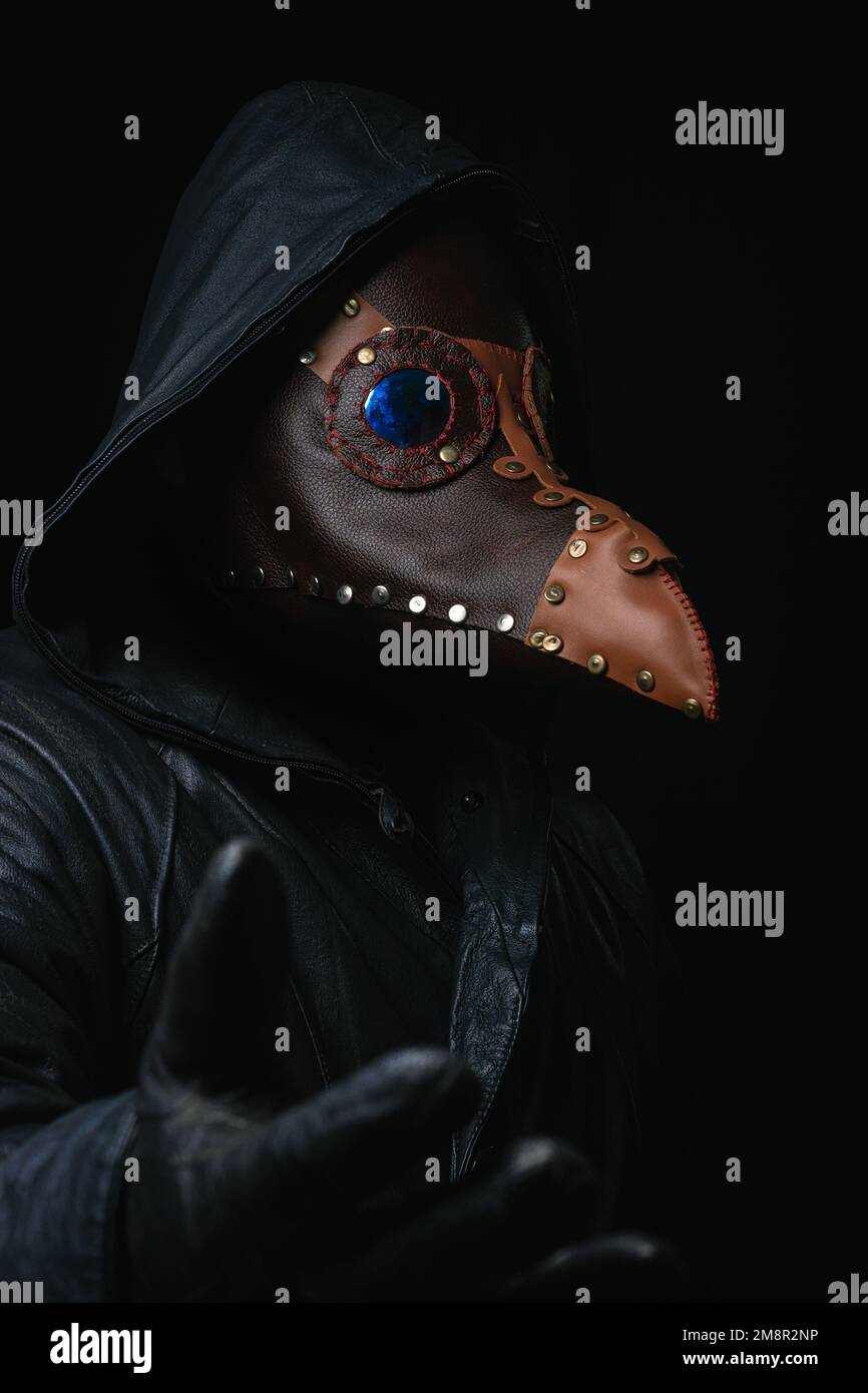 Plague doctor with crow-like mask isolated on black background Creepy ...