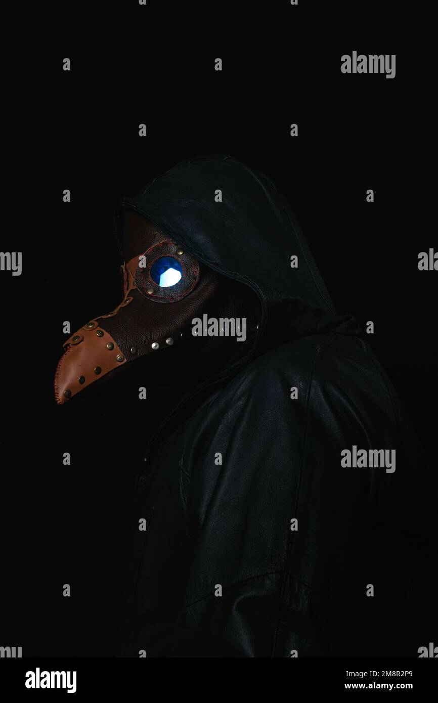 Plague doctor with crow-like mask isolated on black background Creepy ...