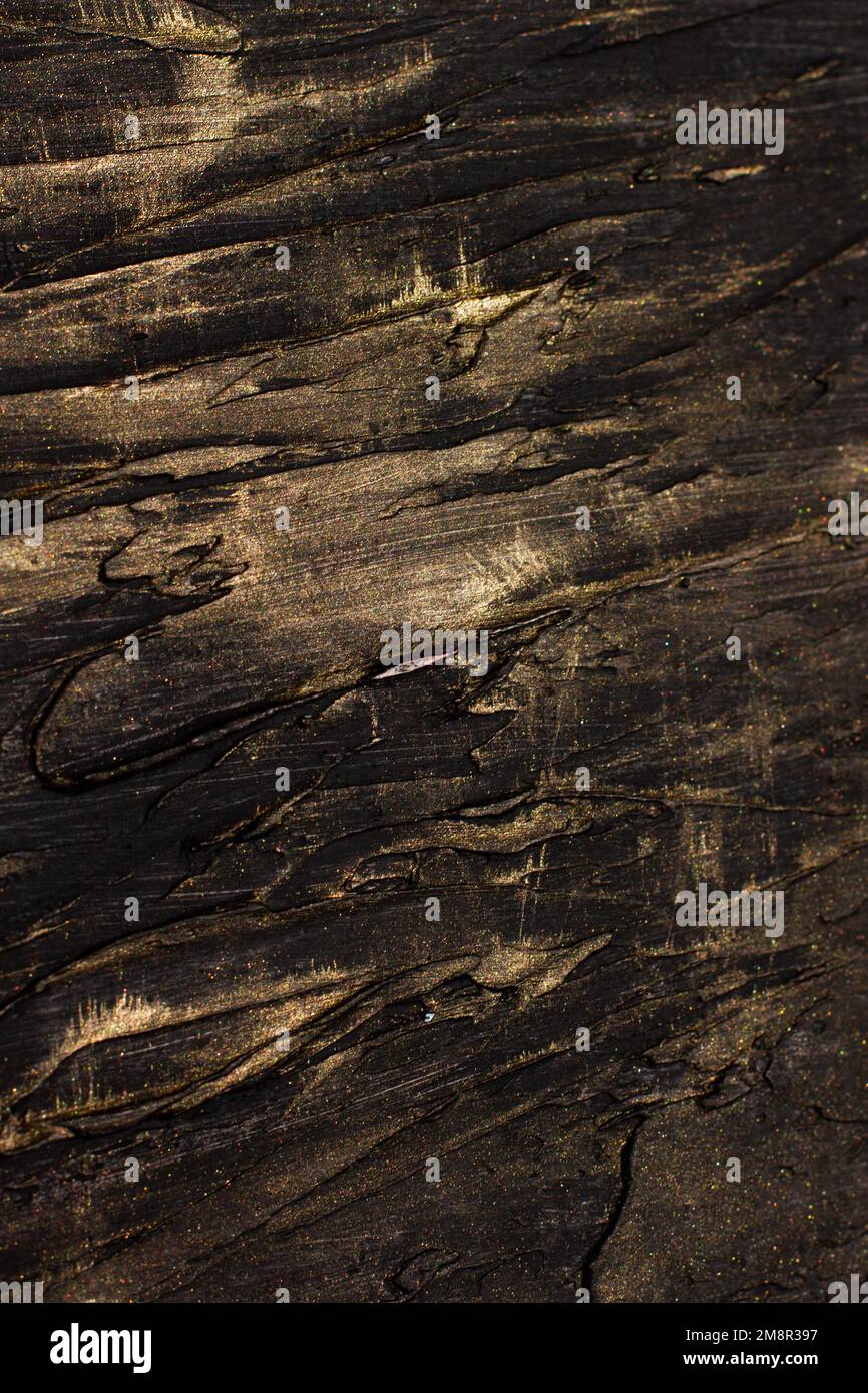 Texture evening rough waves with golden shine Stock Photo - Alamy