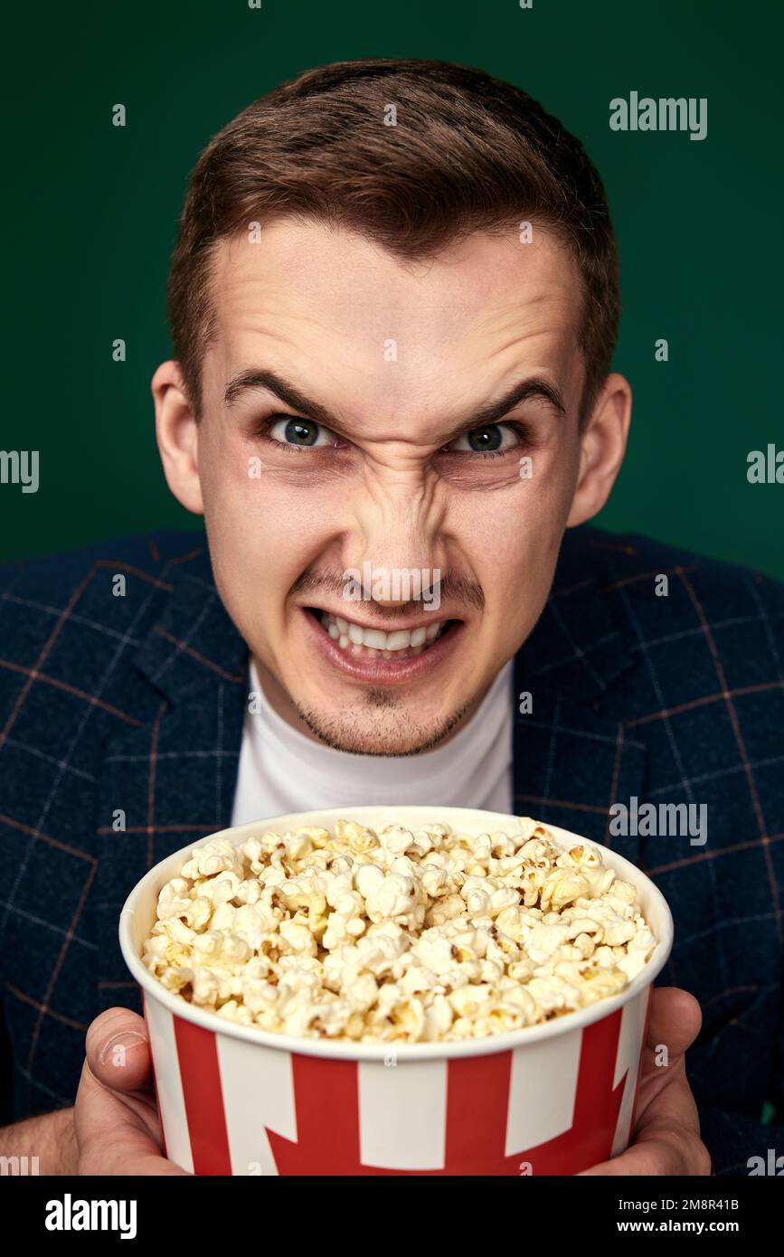 Close up man eat popcorn hi-res stock photography and images - Alamy