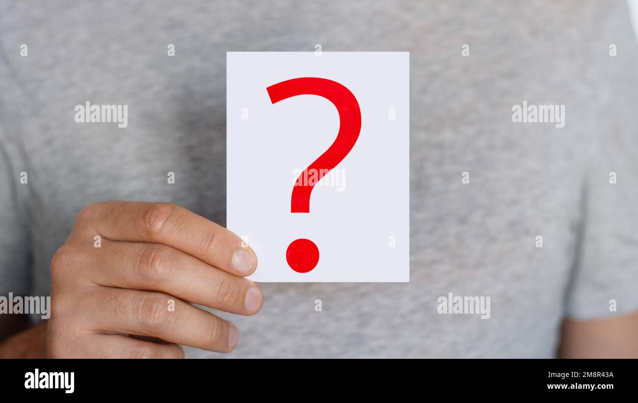 Man holding a question mark. Problems and solutions. Question mark ...
