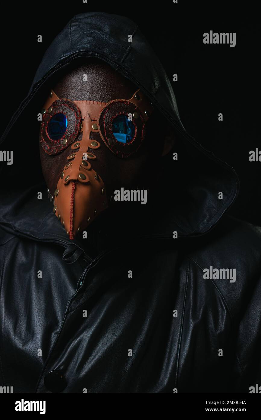 Plague doctor with crow-like mask isolated on black background Creepy ...