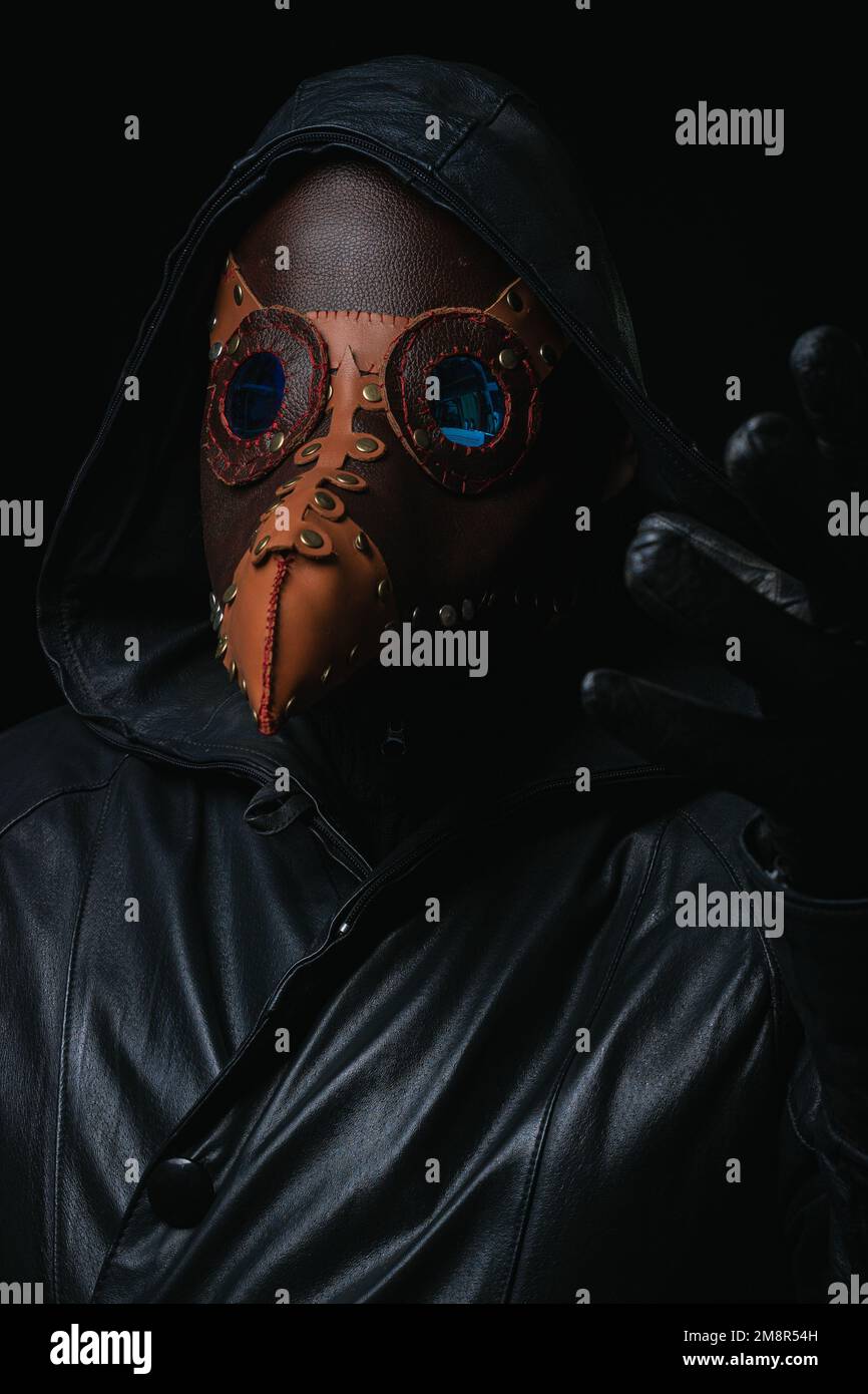 Plague doctor with crow-like mask isolated on black background Creepy ...