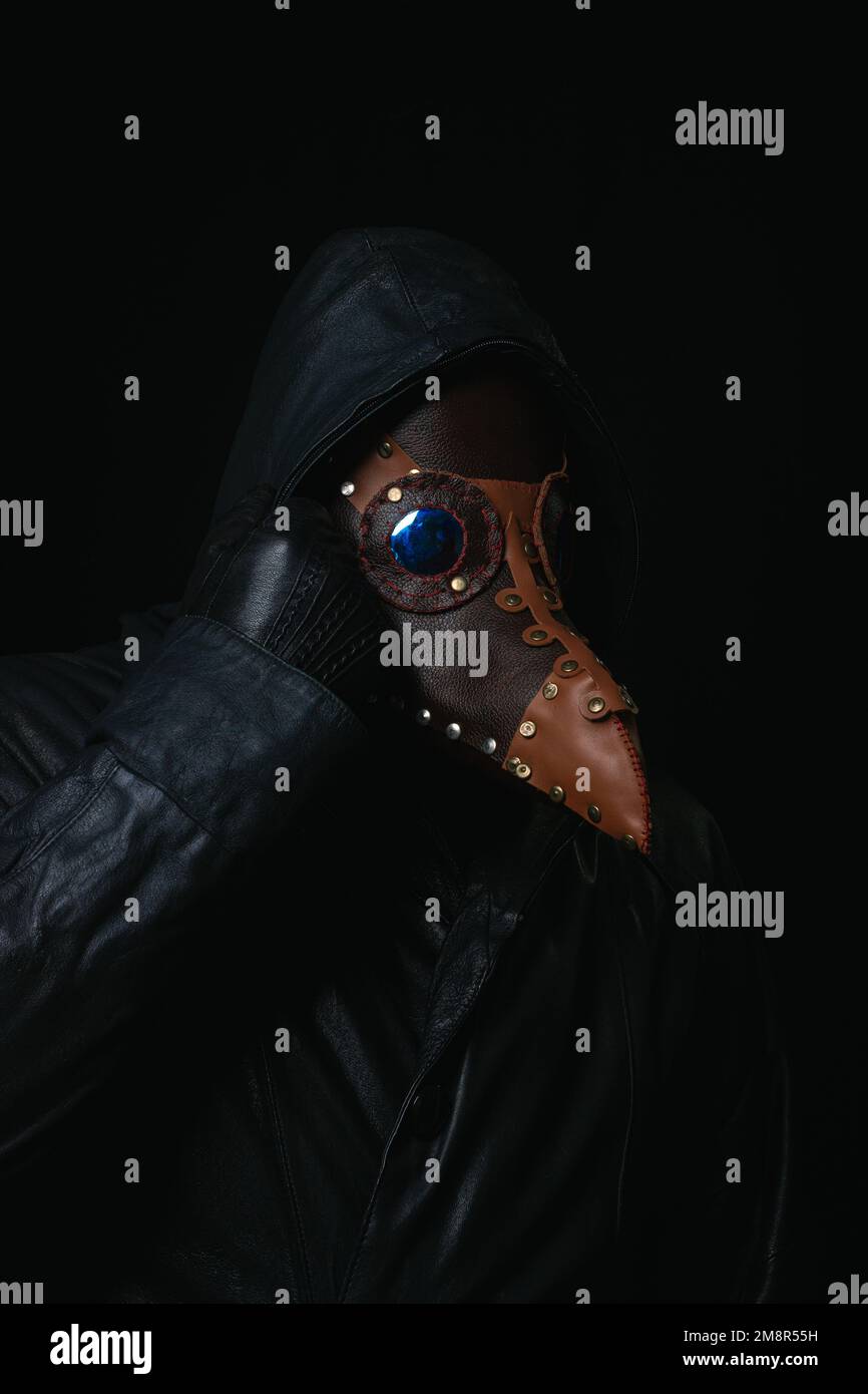 Plague doctor with crow-like mask isolated on black background Creepy ...