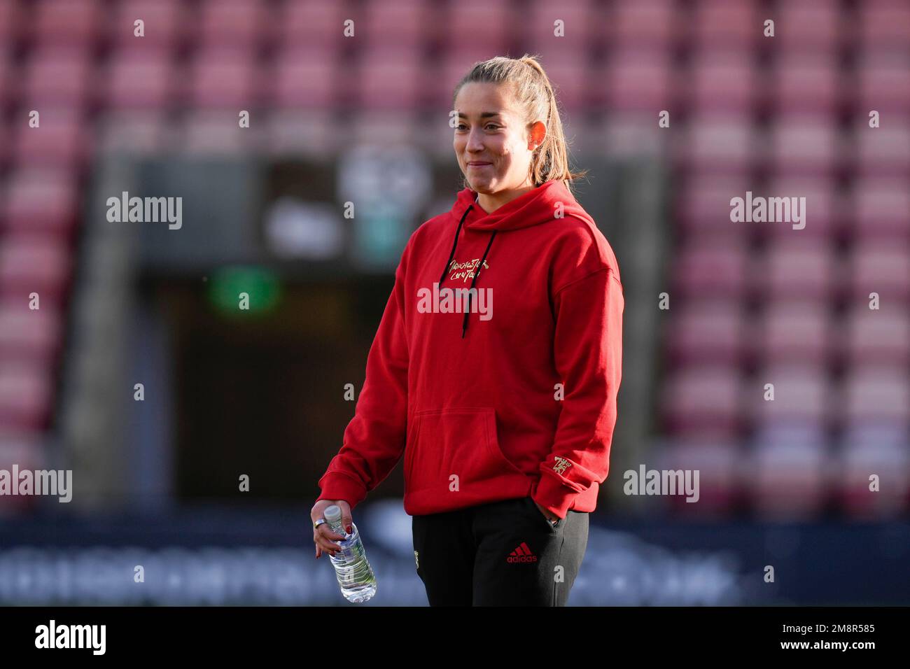 Maya Le Tissier #15 of Manchester United inspects the pitch before the ...