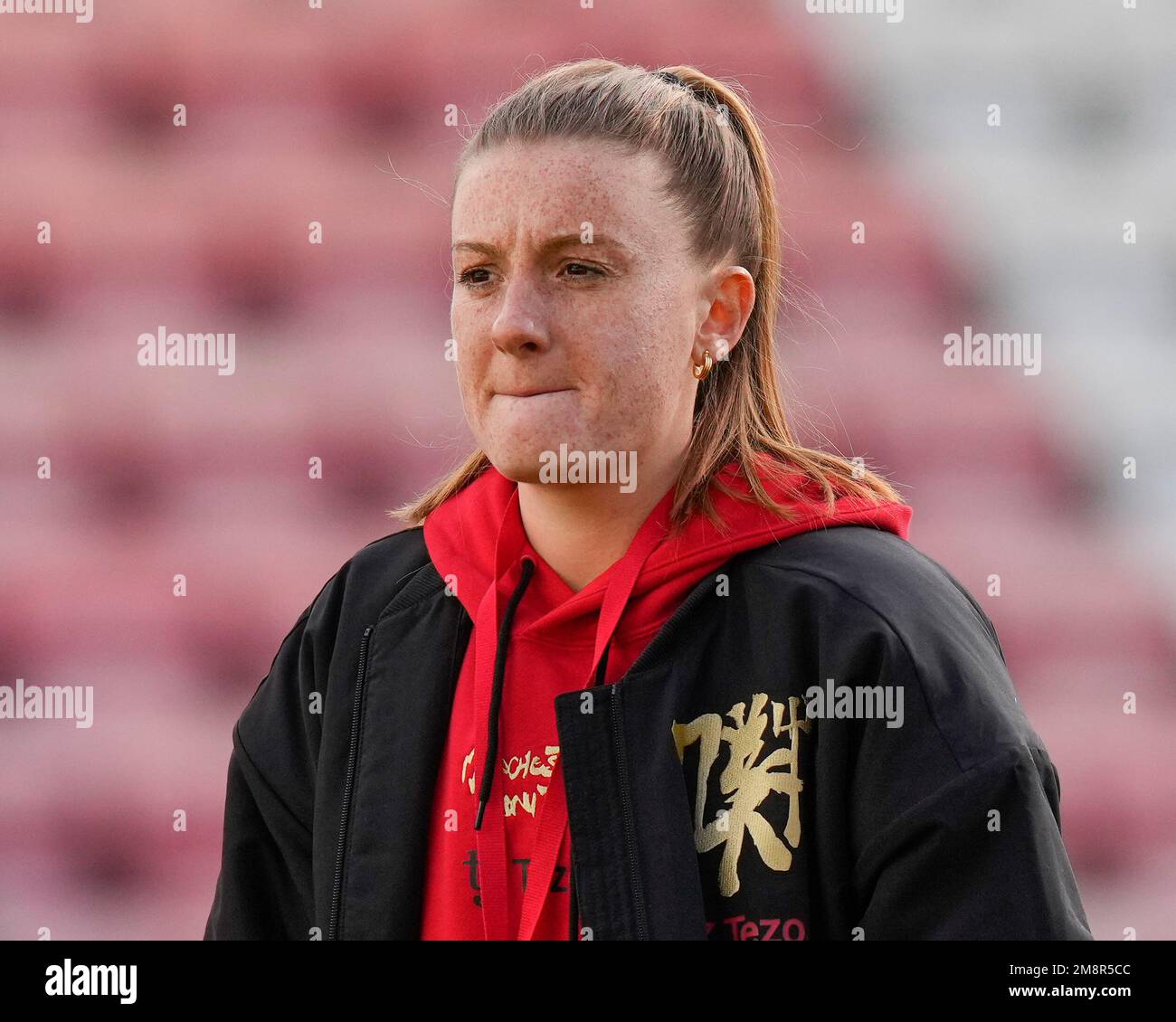 Sophie Baggaley #32 of Manchester United inspects the pitch before the ...