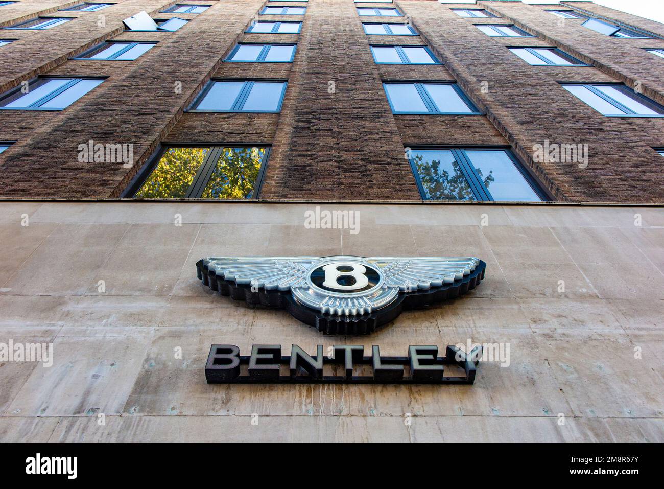 The famous Bentley logo on a car showroom in Berkeley Square, London ...