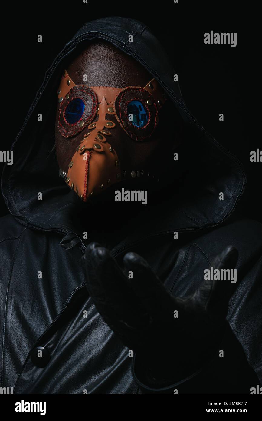 Plague doctor with crow-like mask isolated on black background Creepy ...