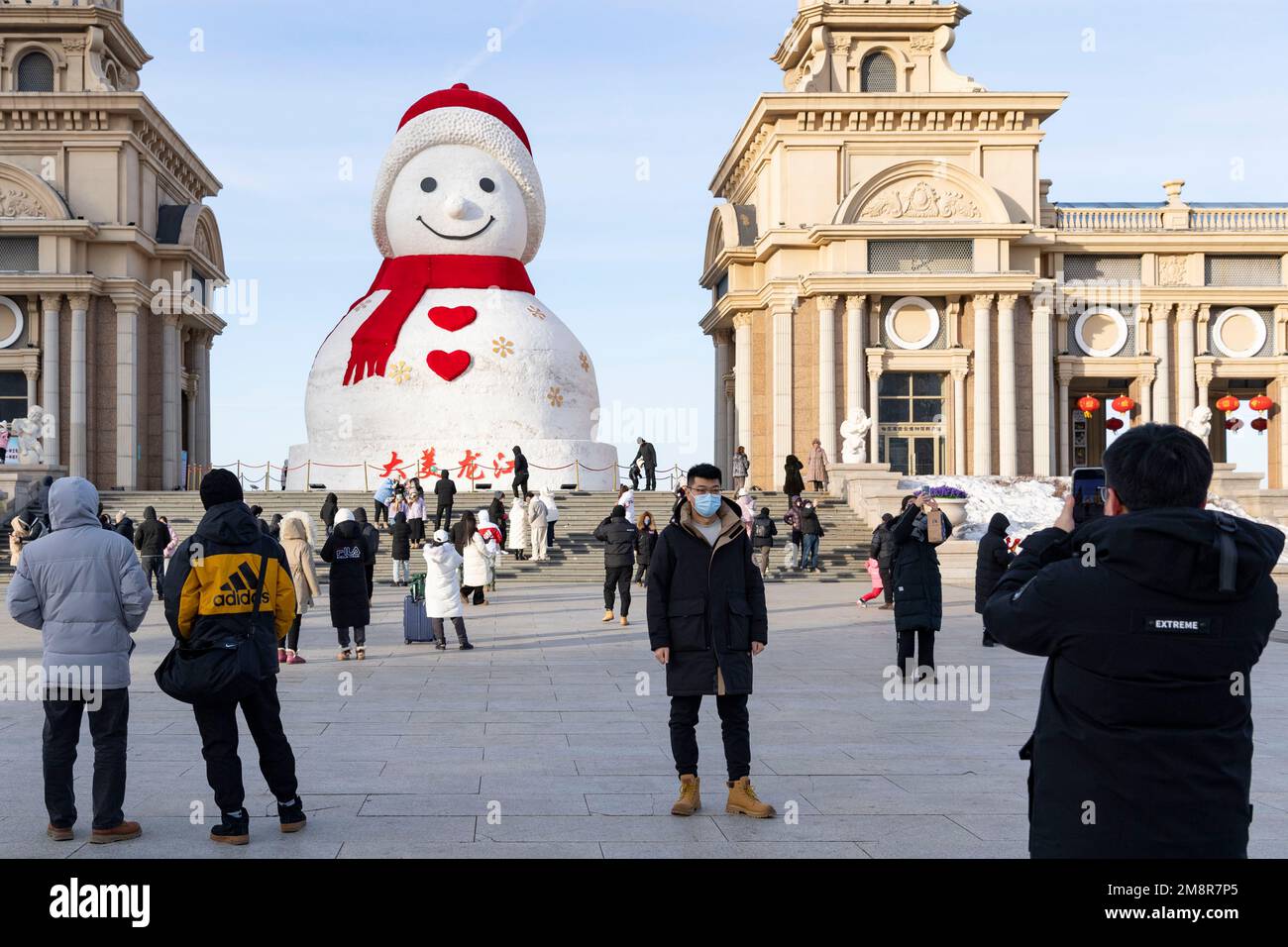 Harbin, China's Heilongjiang Province. 14th Jan, 2023. People pose for ...