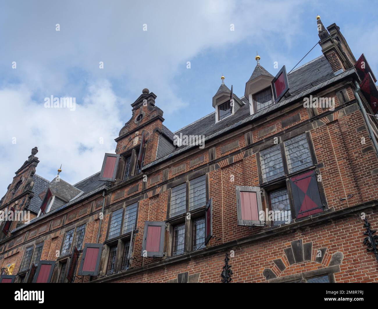 A low-angle of medieval ancient building waag house with a typical ...