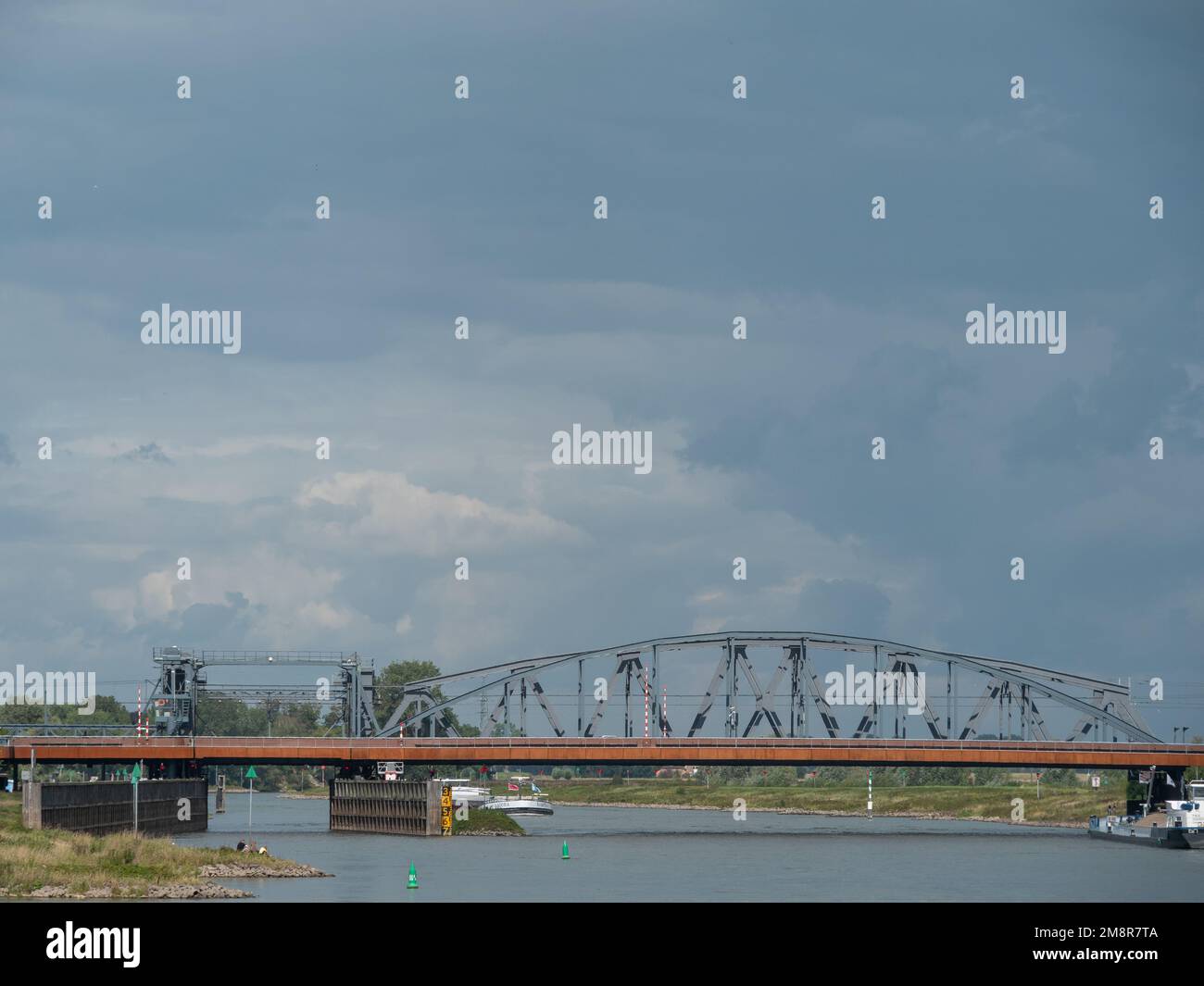 The Burlington Northern railroad bridge on a sunny day, cloudy sky ...