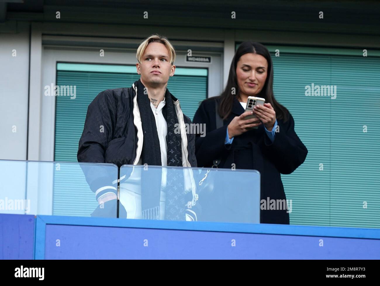 Chelsea new signing Mykhailo Mudryk (left) in the stands ahead of the ...