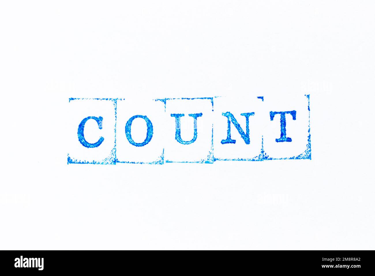 Blue color ink rubber stamp in word count on white paper background ...