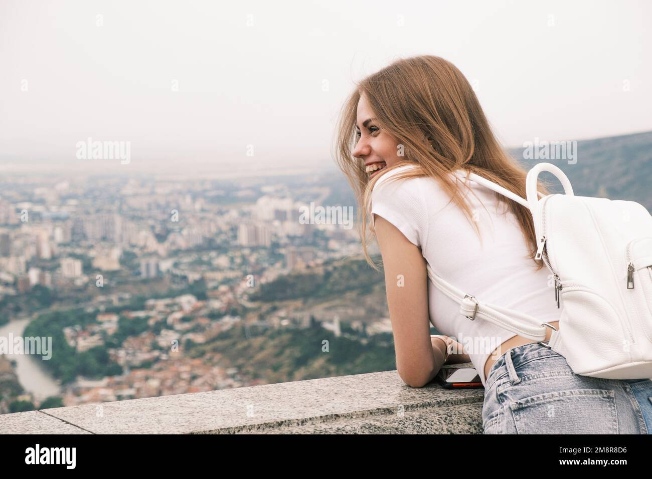 Woman on colorful background. Young woman face portrait. Cityscape ...
