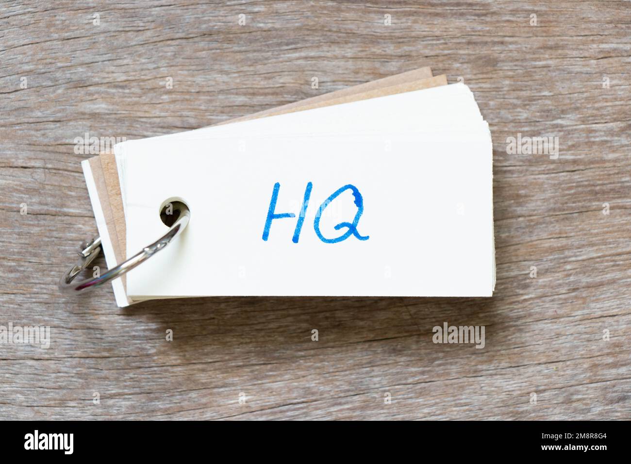 Flash card with handwriting in word HQ (Abbreviation of headquarters ...
