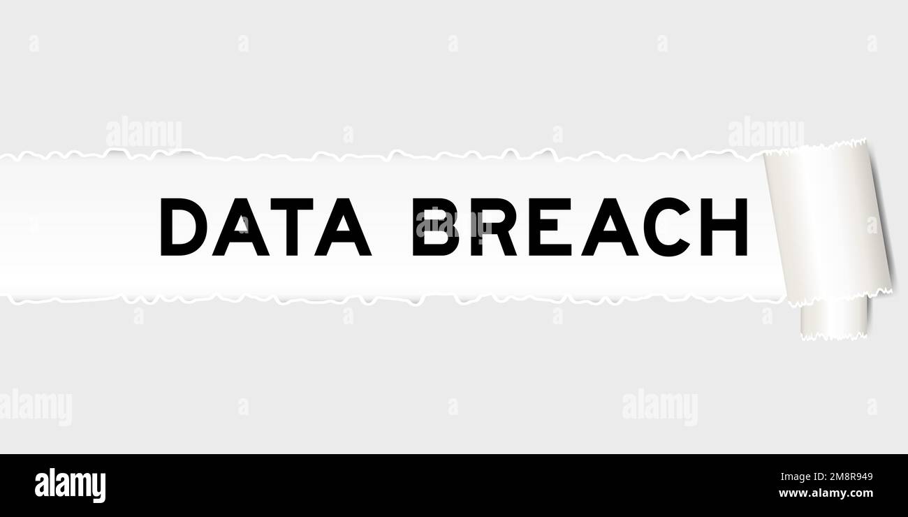 Ripped gray paper background that have word data breach under torn part ...