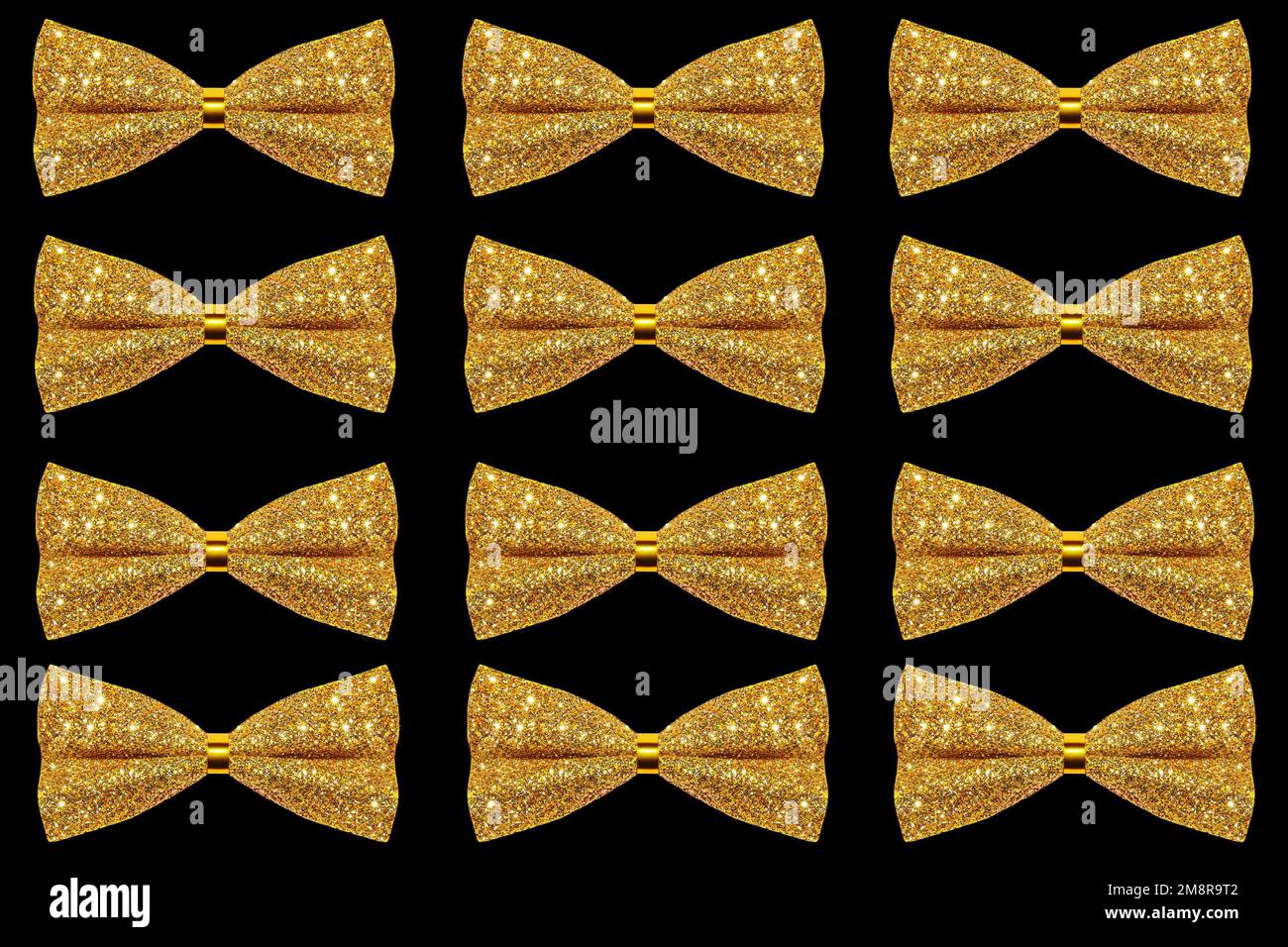 Lots of golden bows on a black background Stock Photo - Alamy