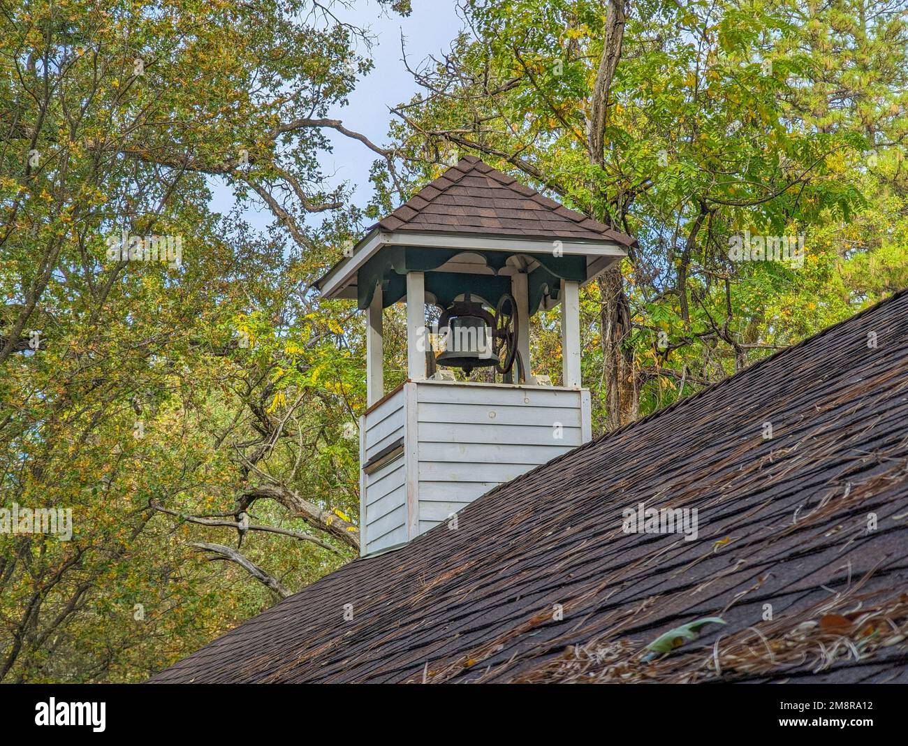 A rural school bell on the rooftop Stock Photo - Alamy