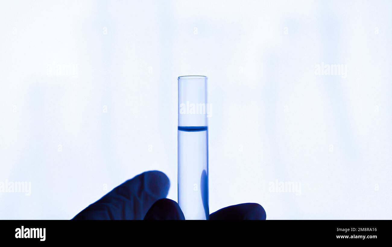 laboratory equipment. Test tube. Test tube with clear liquid ...