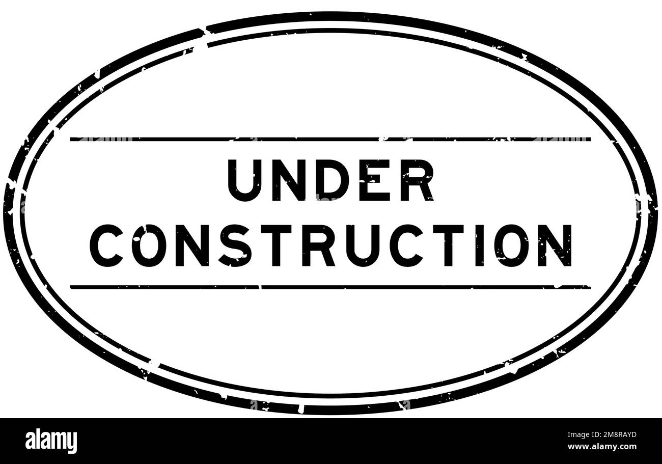 Grunge black under construction word oval rubber seal stamp on white ...