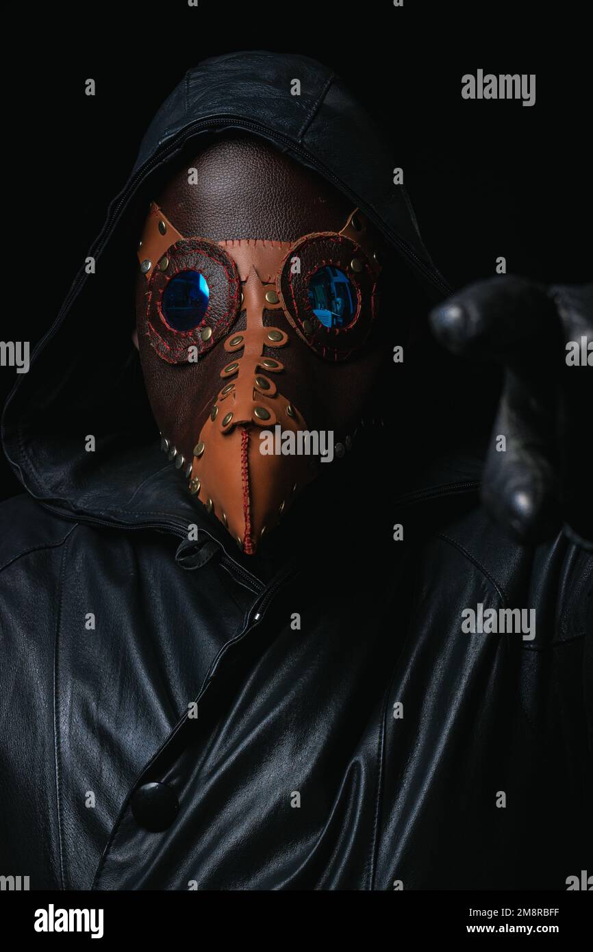 Plague doctor with crow-like mask isolated on black background Creepy ...