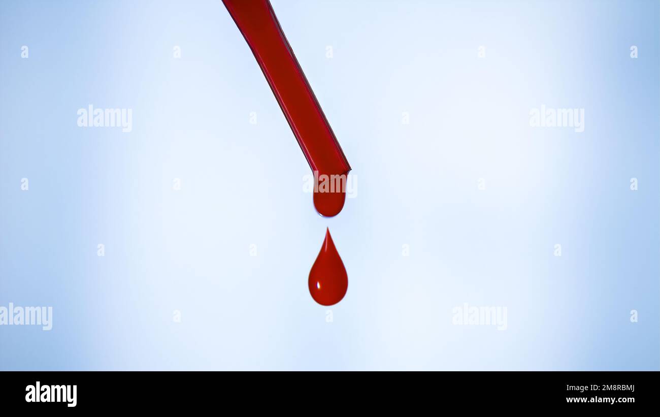 A drop of blood. Pipette. Dripping red liquid. A drop of red. Tests ...