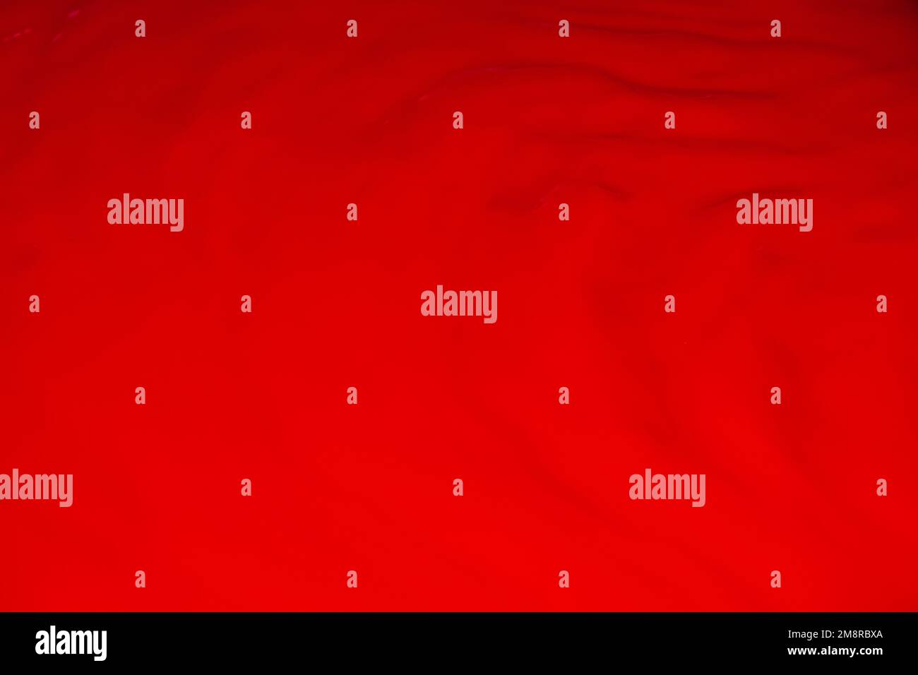 Red liquid, waves, fluidity Stock Photo - Alamy