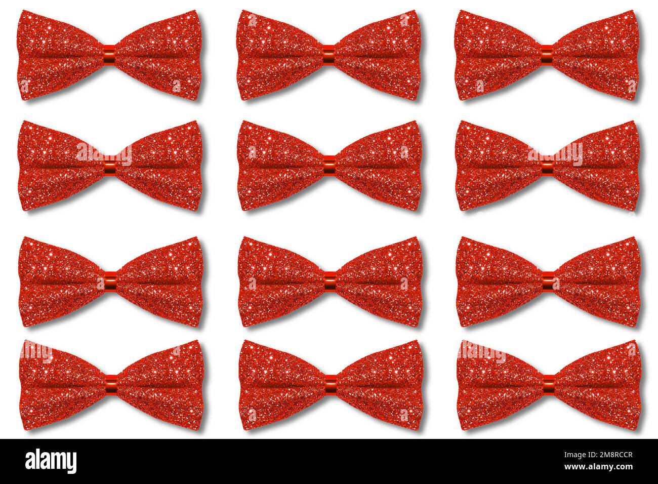 Lots of red shiny bows on a white background Stock Photo - Alamy