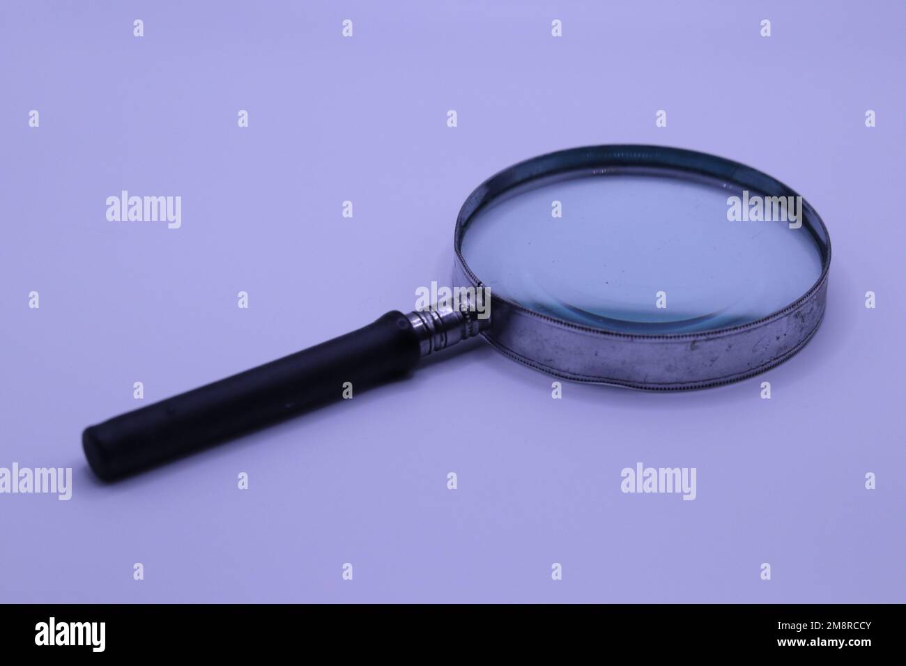 An old magnifying glass Stock Photo - Alamy