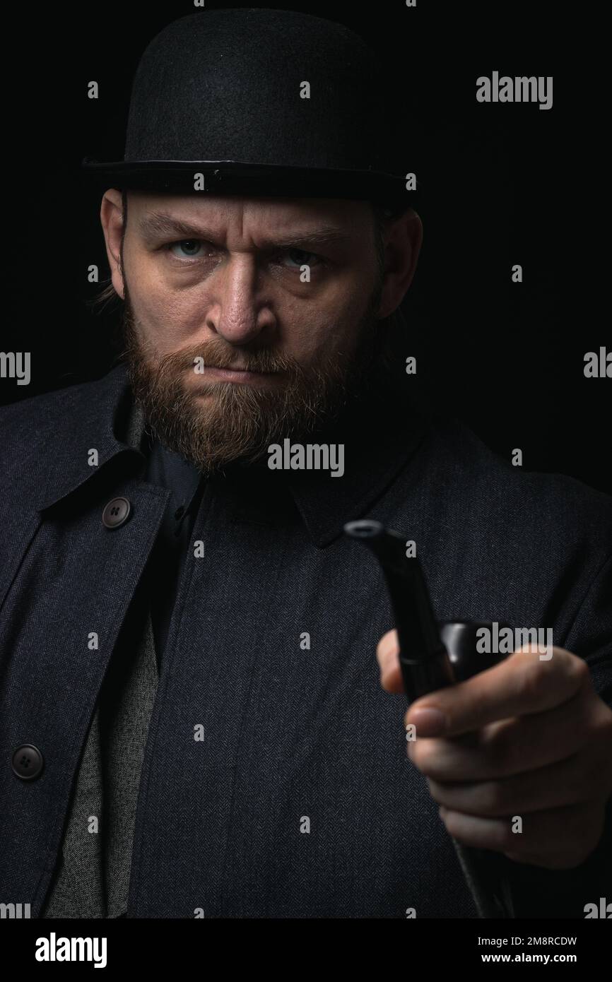 stylish man in retro outfit suit hat smoking wooden pipe sherlock ...