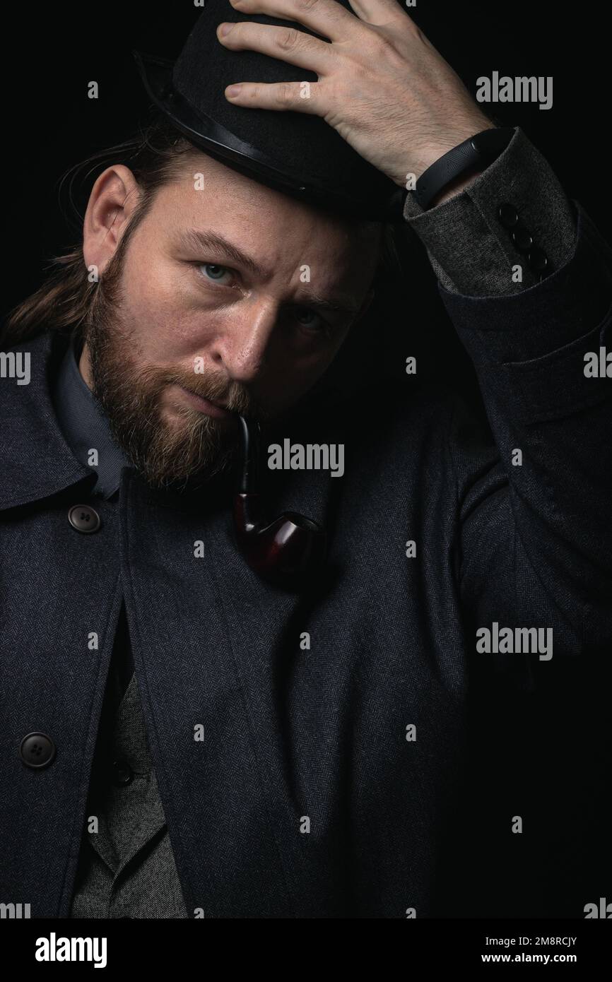 stylish man in retro outfit suit hat smoking wooden pipe sherlock ...