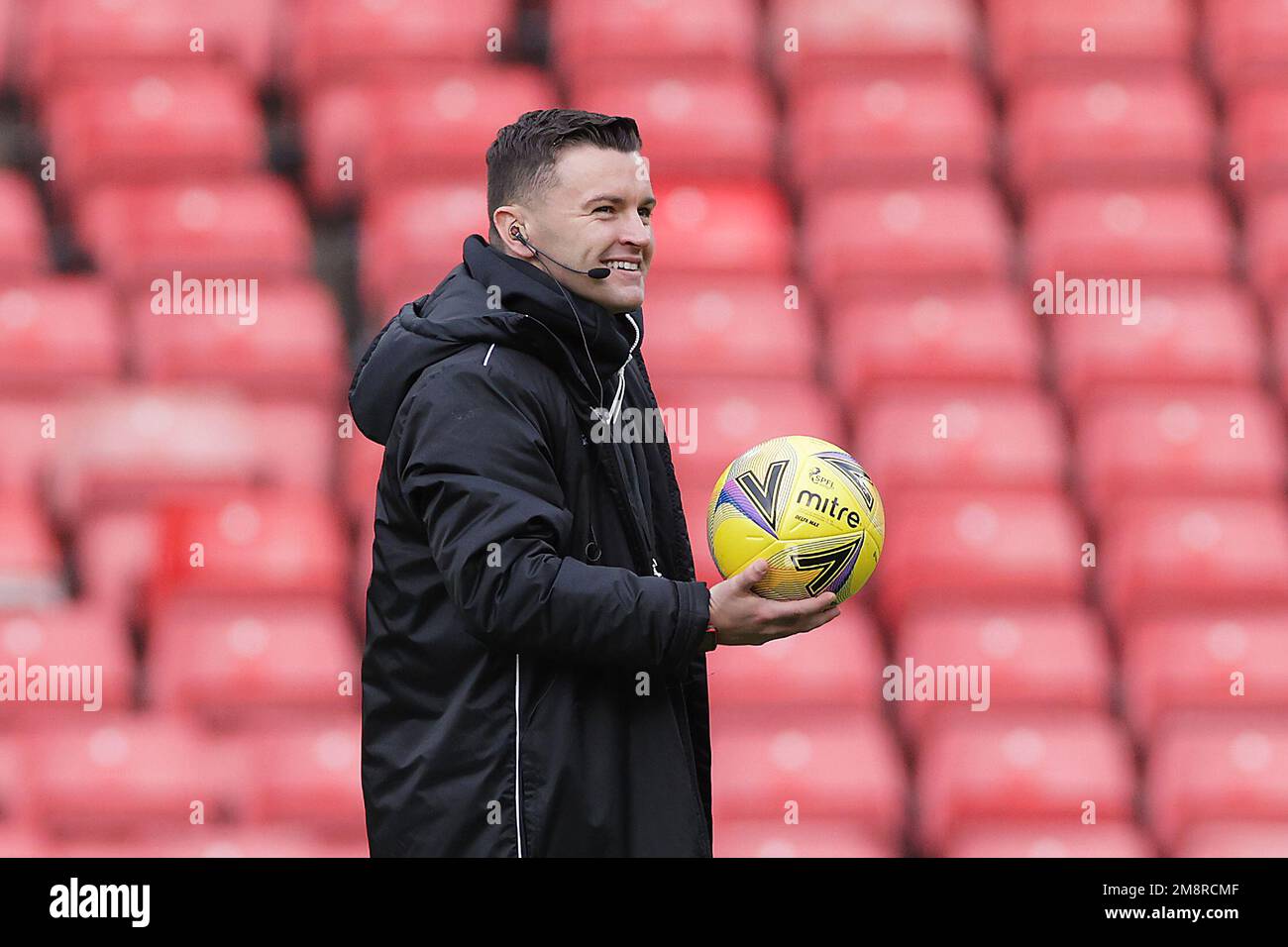 Referee Nick Walsh inspects the pitch ahead of the Viaplay Cup semi ...