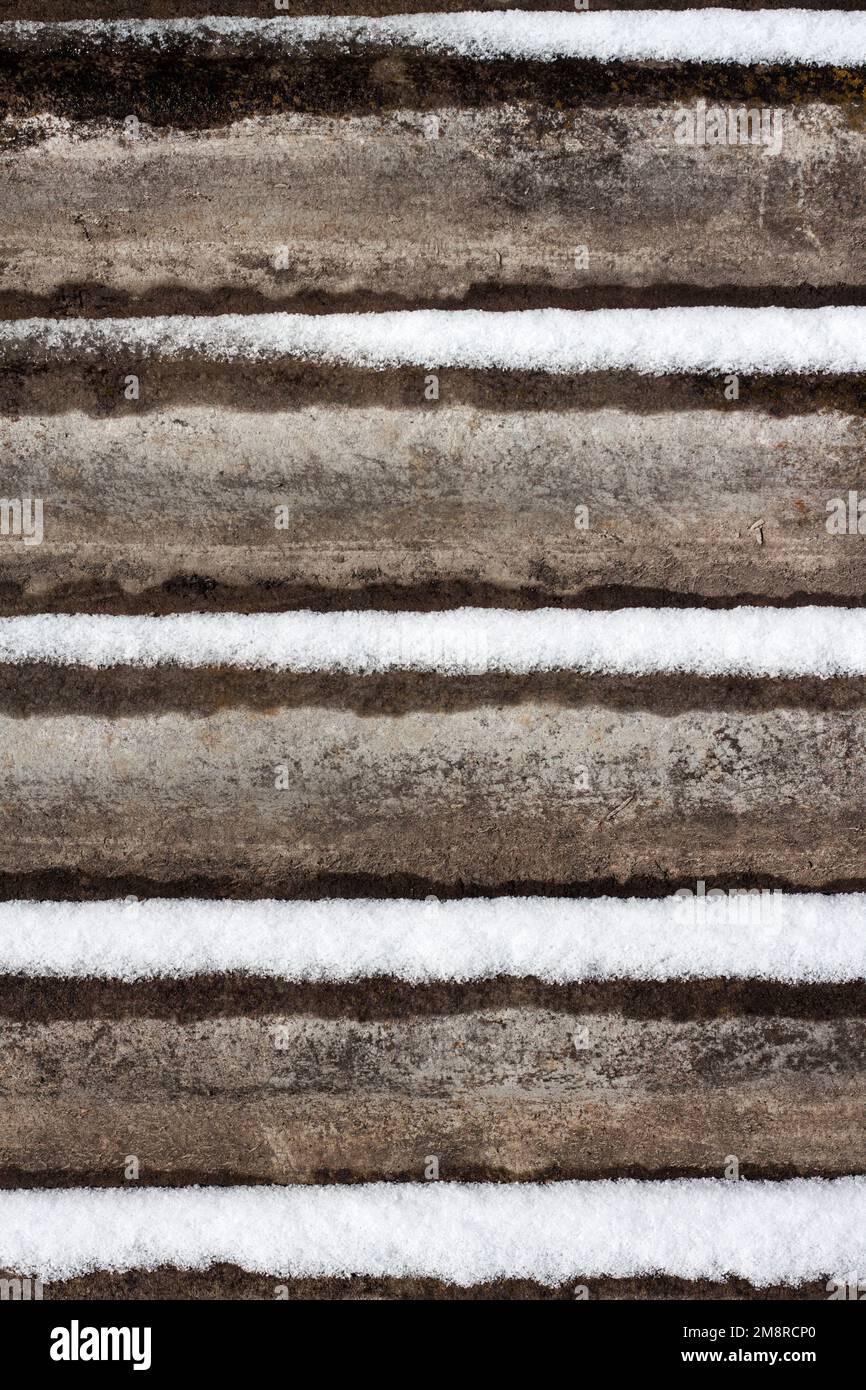 Slate background with snow lying on it Stock Photo - Alamy
