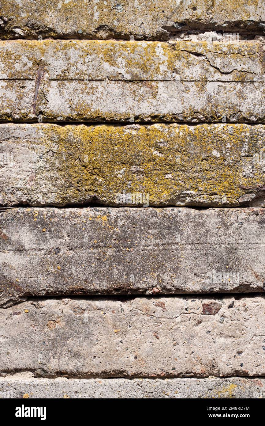 Old concrete blocks wall background closeup. Industrial background ...