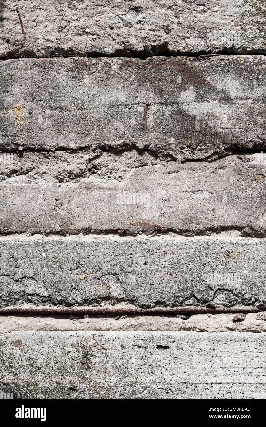 Old concrete blocks wall background closeup. Industrial background ...