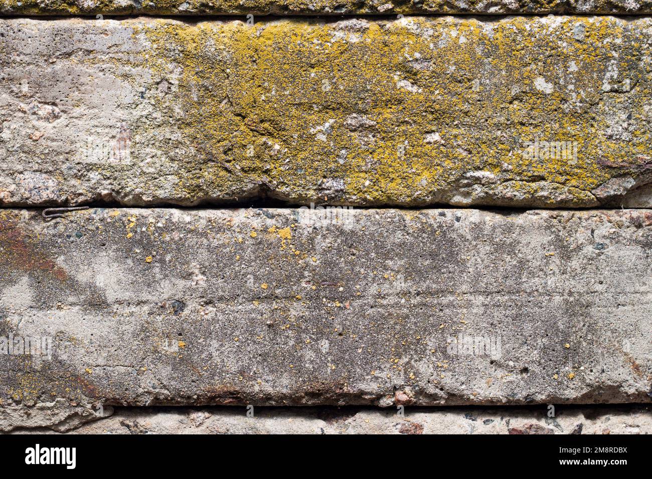 Old concrete blocks wall background closeup. Industrial background ...