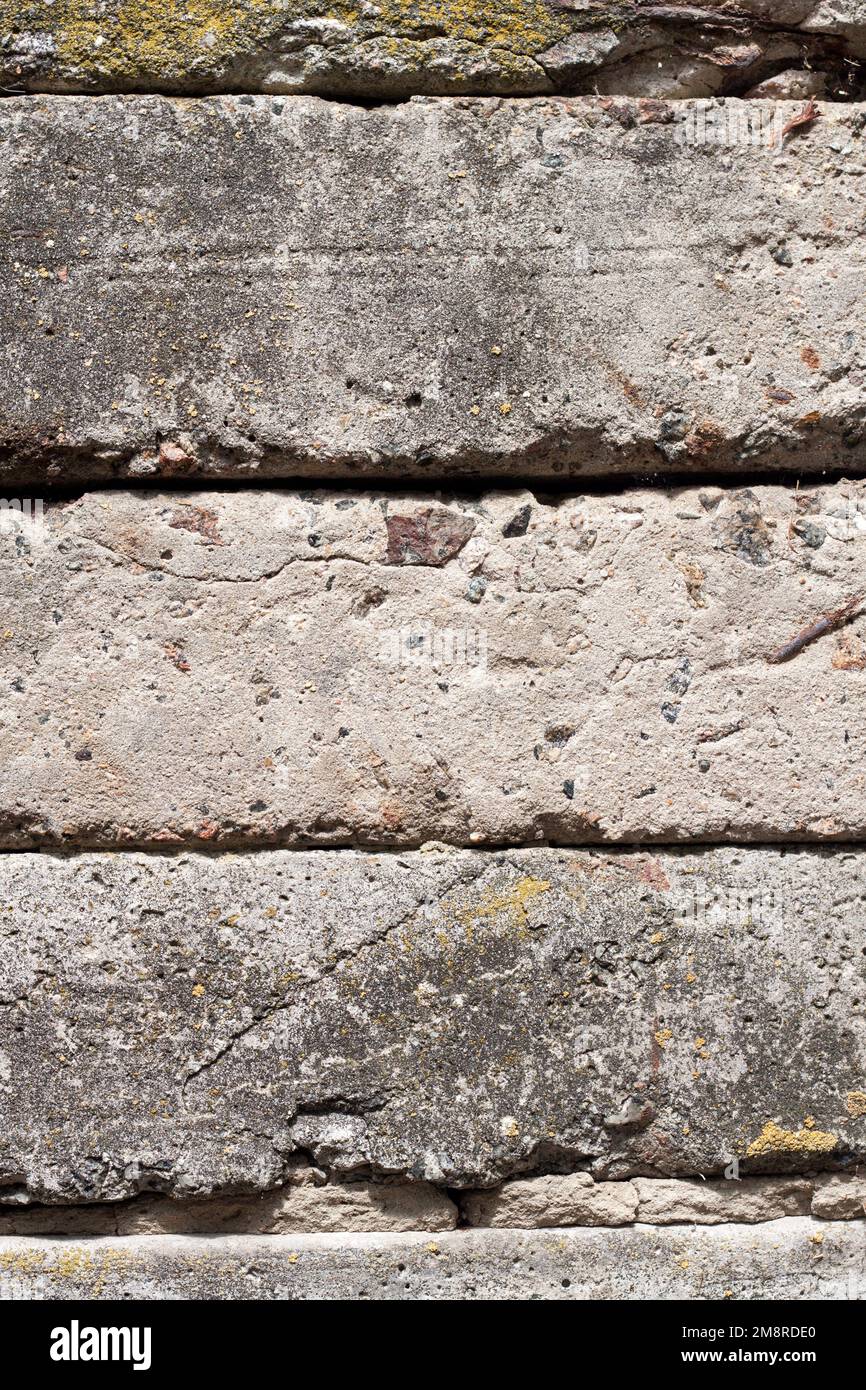 Old concrete blocks wall background closeup. Industrial background ...