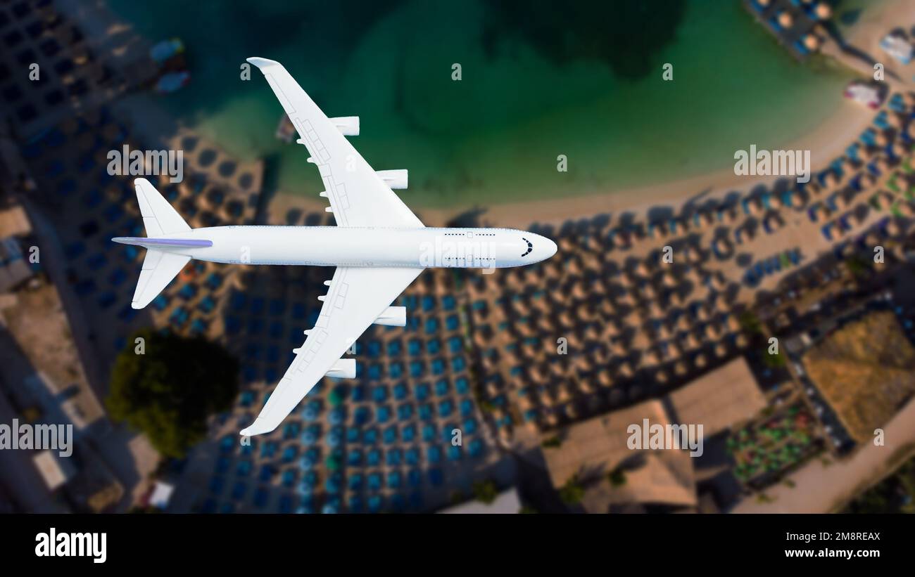 plane flies above the landscape. Side view of aircraft. Travel and ...