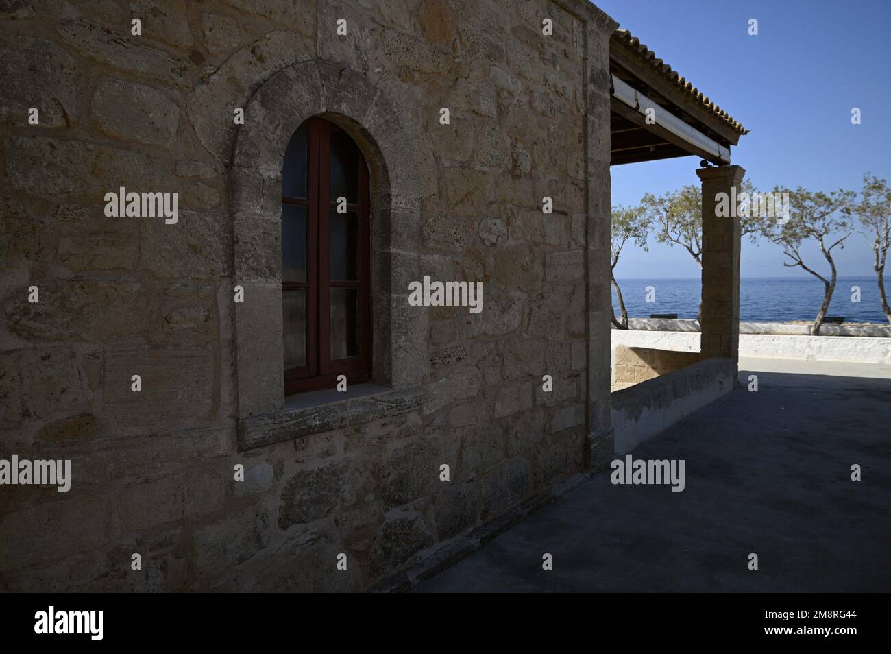 Scenic exterior view of Aghioi Theodoroi a picturesque stone built ...