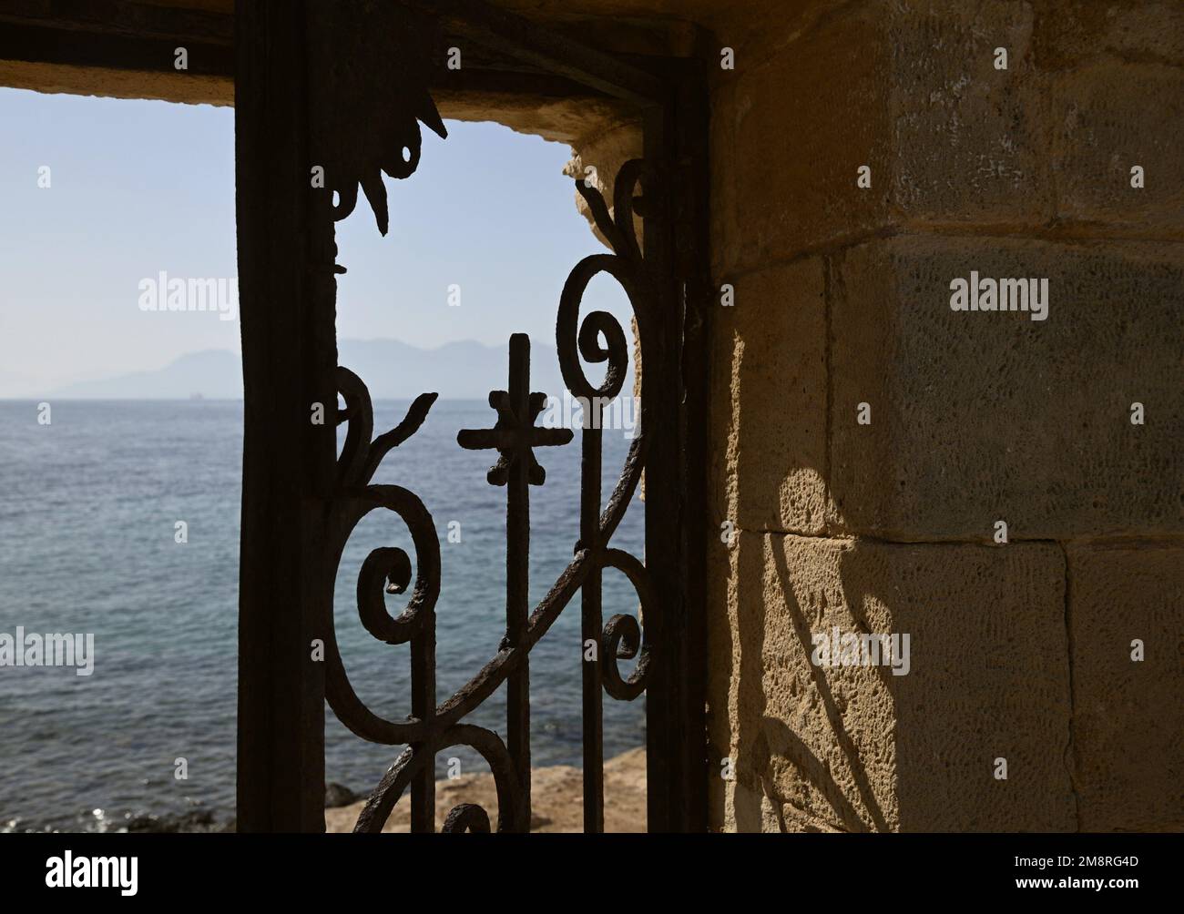 Traditional handcrafted wrought iron main entrance gate of Aghioi ...