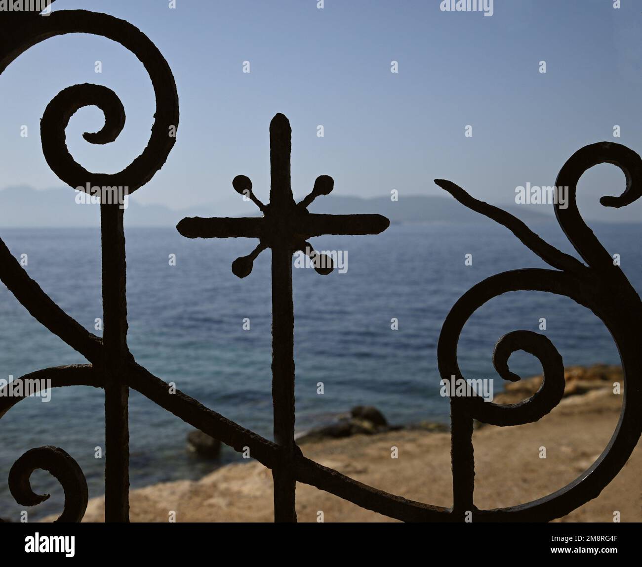 Traditional handcrafted wrought iron main entrance gate of Aghioi ...