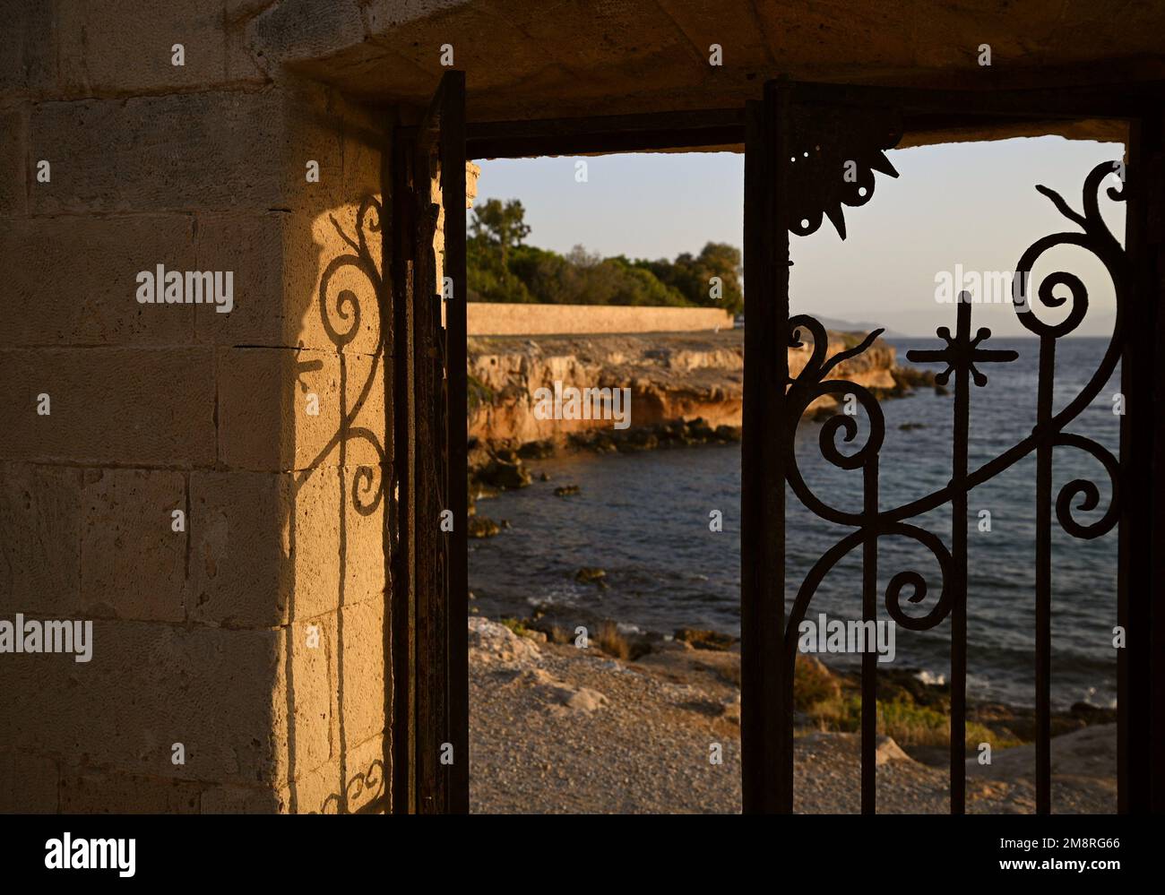 Traditional handcrafted wrought iron main entrance gate of Aghioi ...