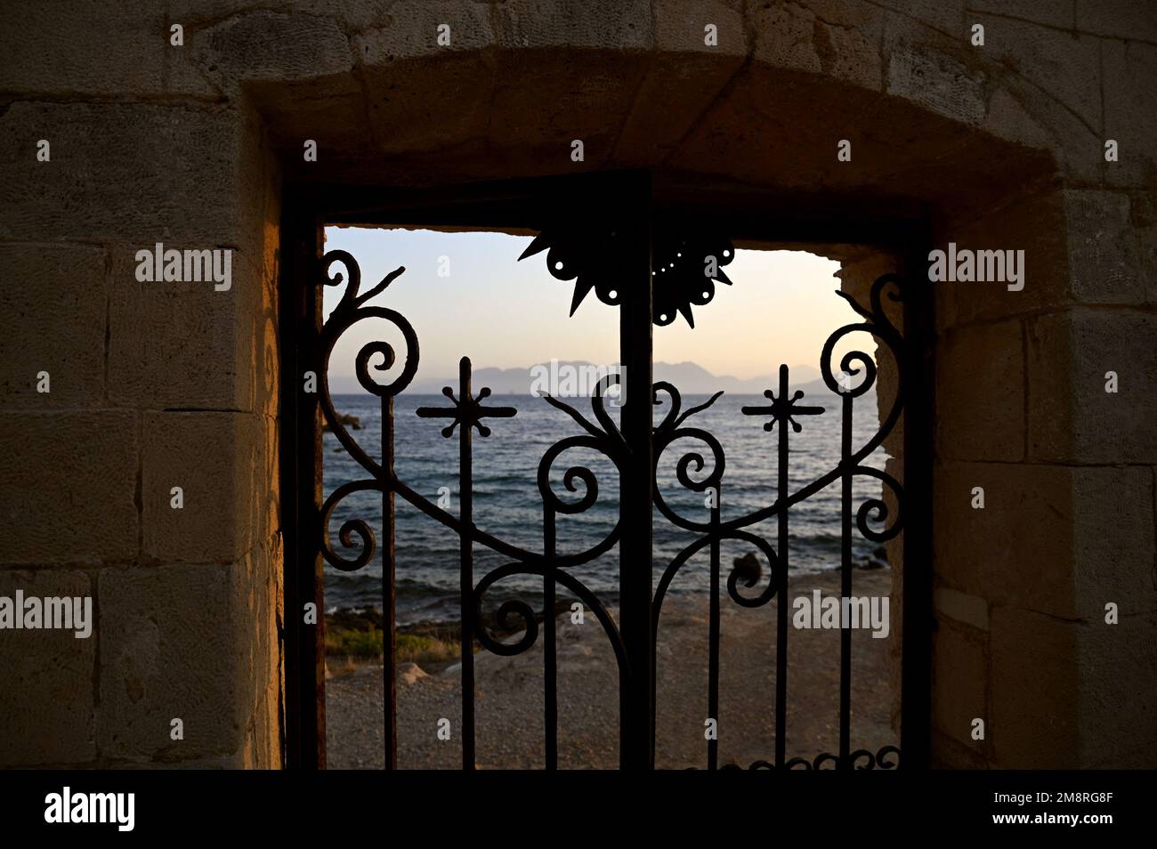 Traditional handcrafted wrought iron main entrance gate of Aghioi ...