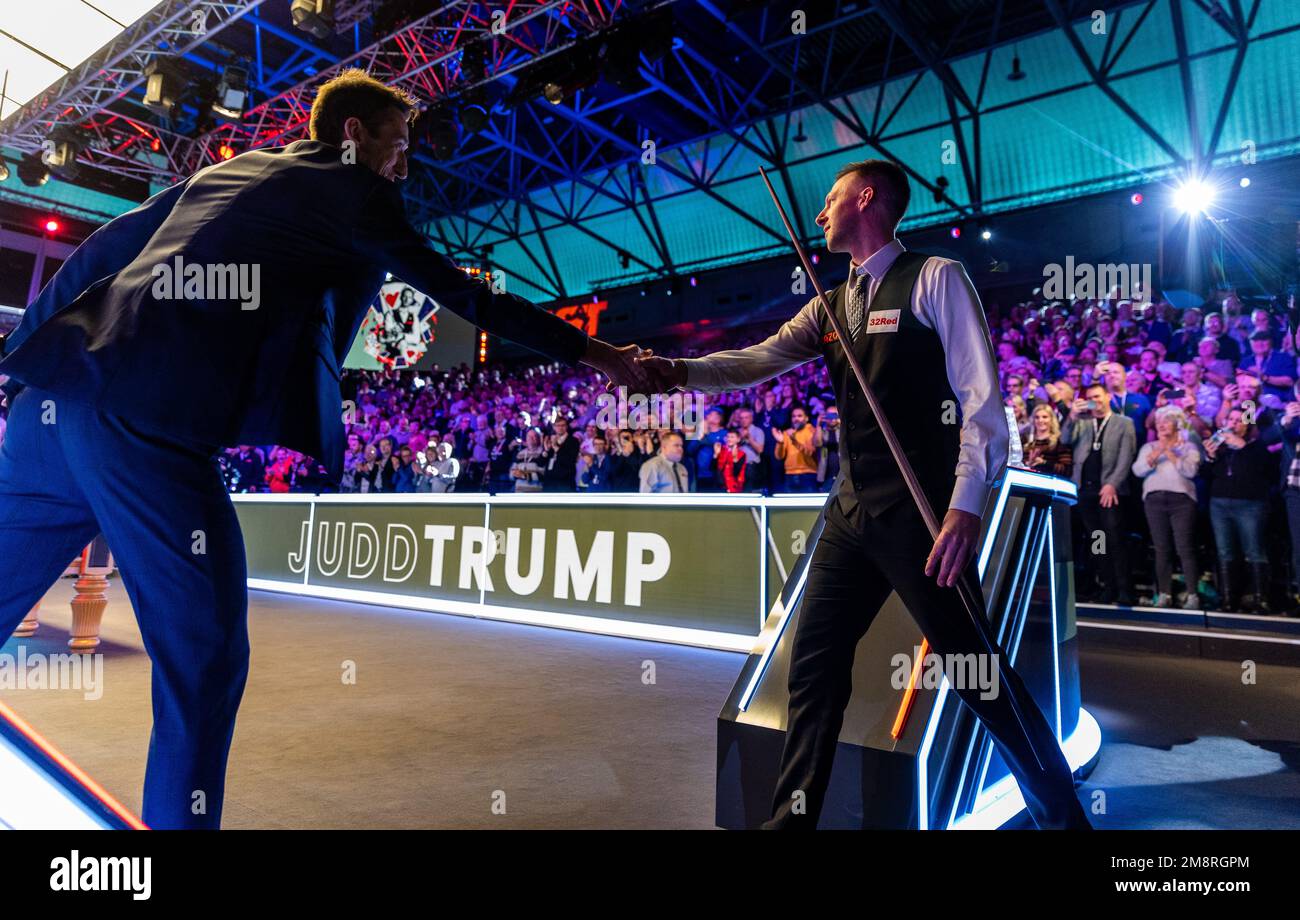 Judd Trump shakes hands with Rob Walker walking into the arena ahead of ...