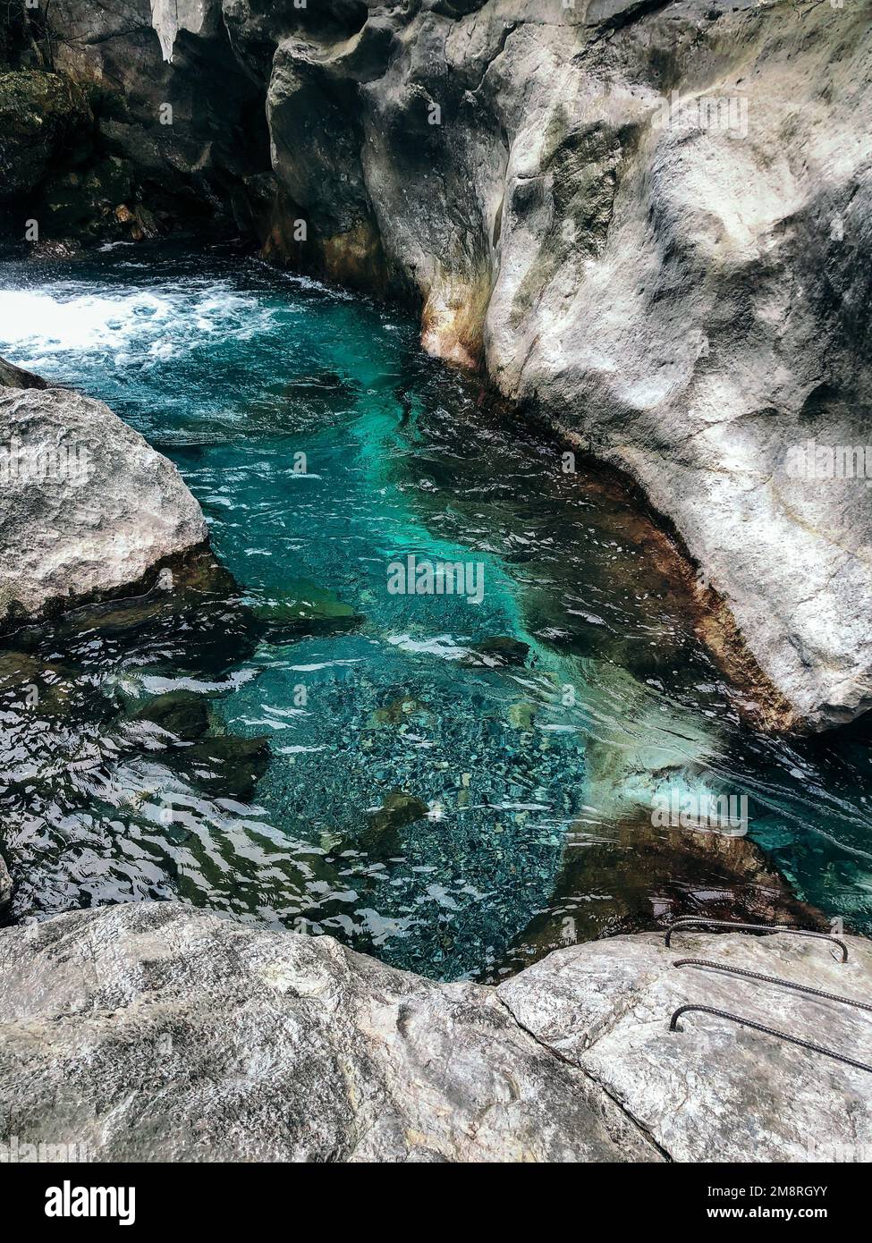 stone canyon with azure river Stock Photo - Alamy