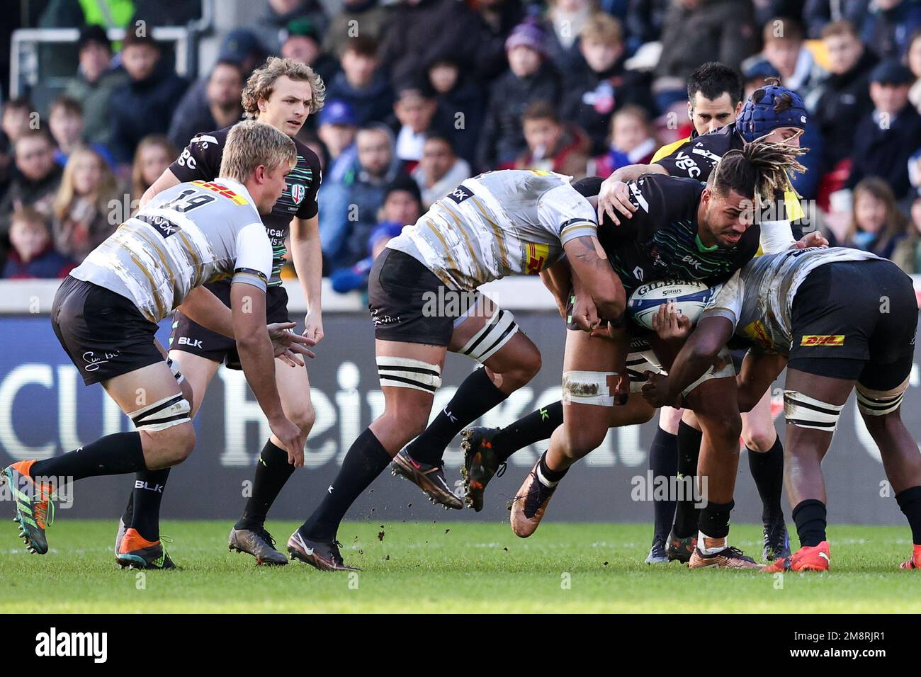 Chandler Cunningham-South of London Irish is double-tackled during the ...