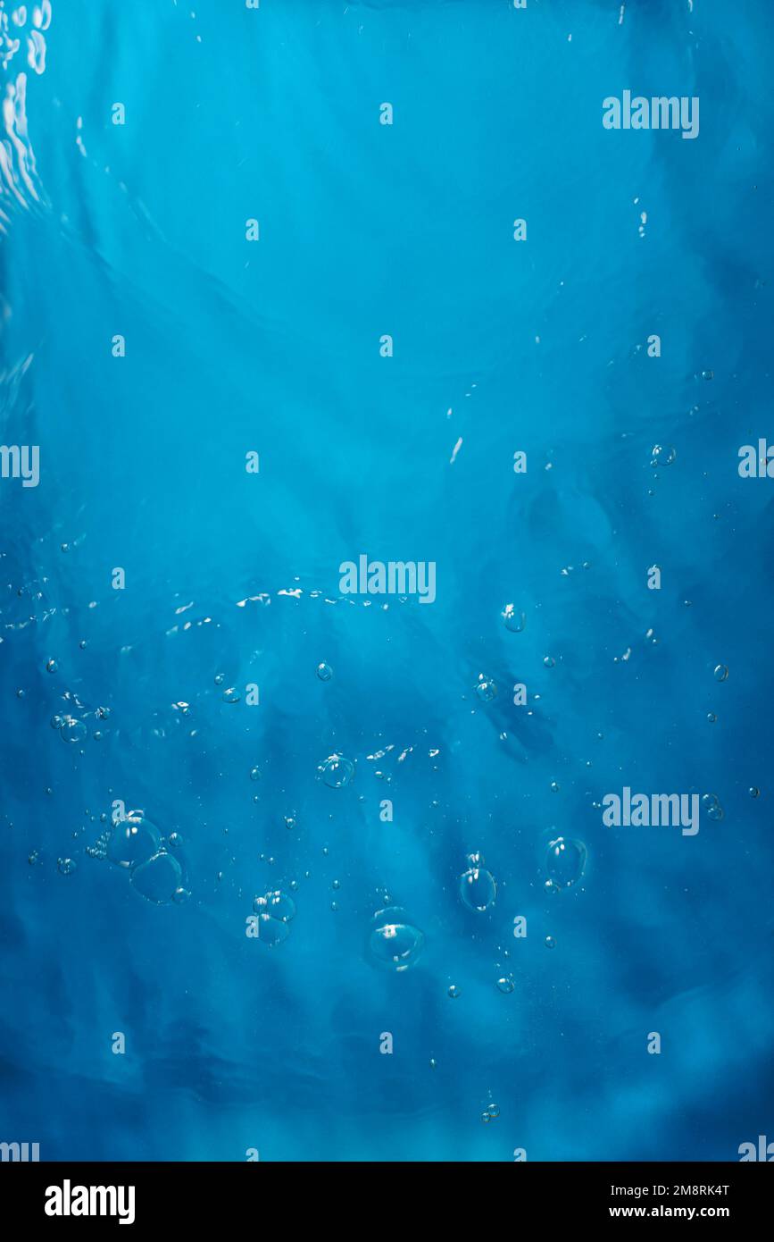 Beautiful bright blue ocean water with waves and bubbles Stock Photo ...
