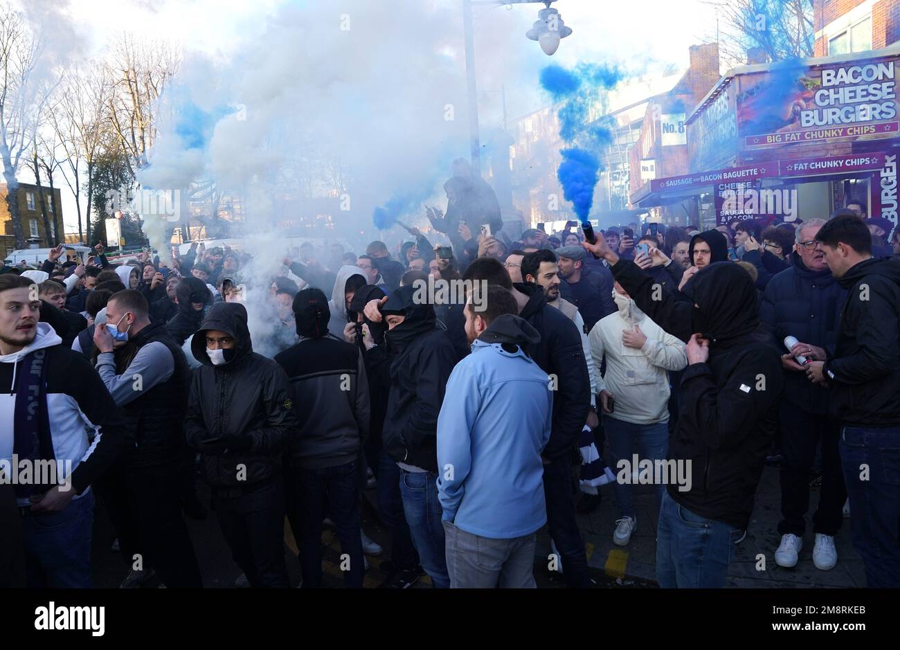 Tottenham Hotspur fans set off smoke flares as they gather outside ...